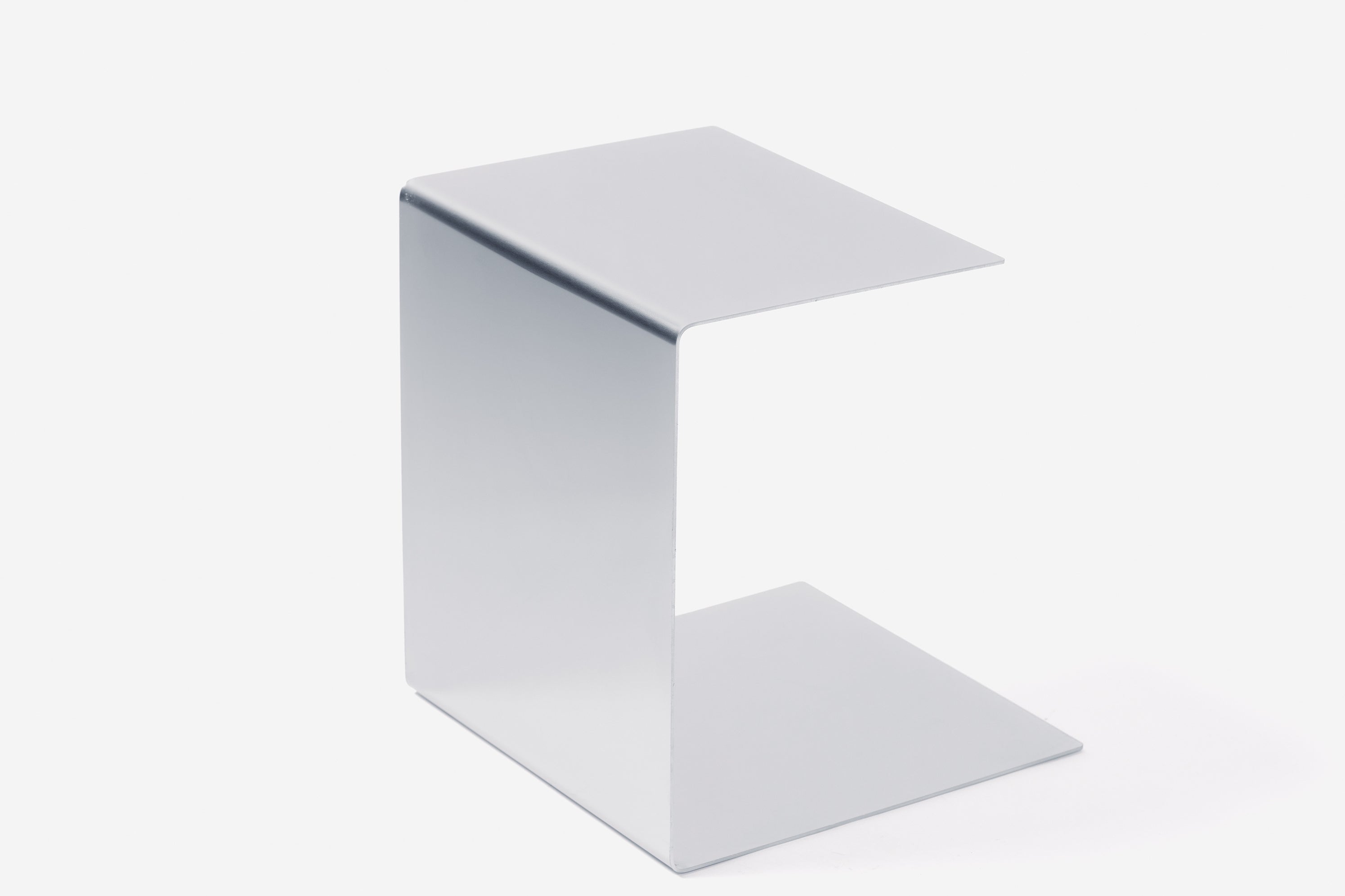 Polished steel side table– B E N T